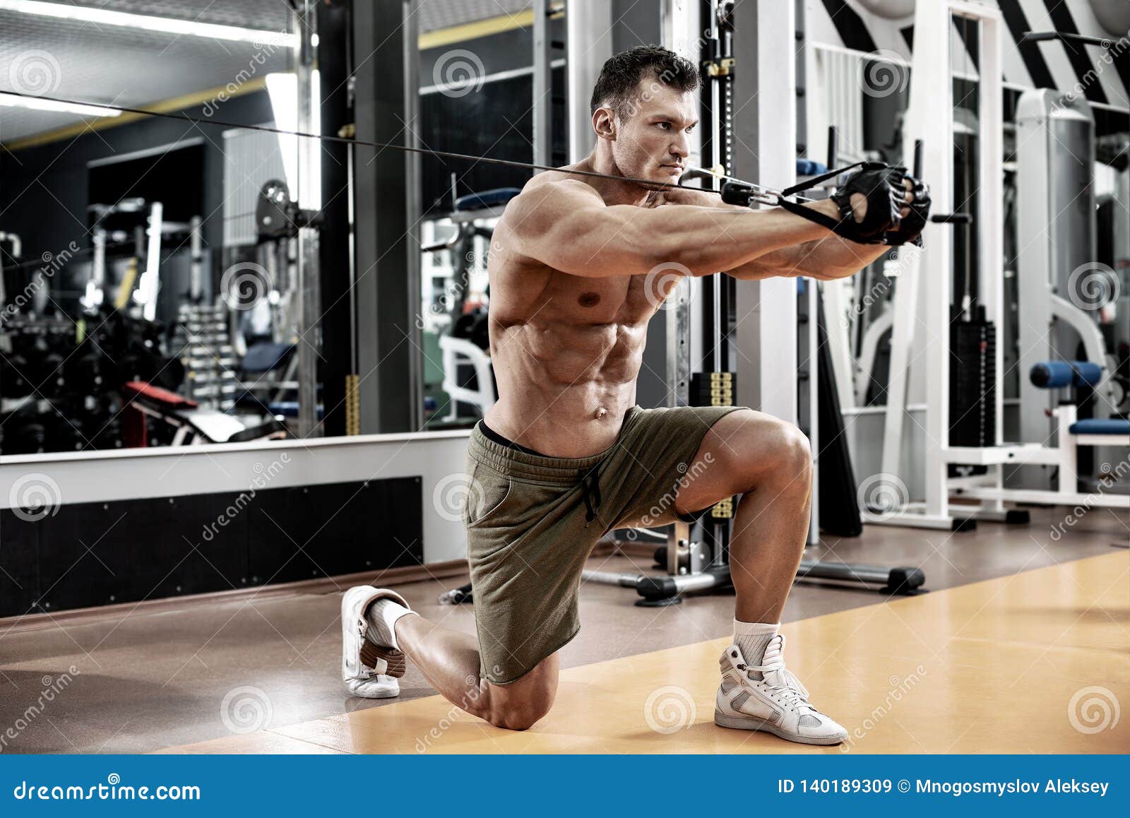 Guy Bodybuilder with Exercise Machine Stock Image - Image of physical ...