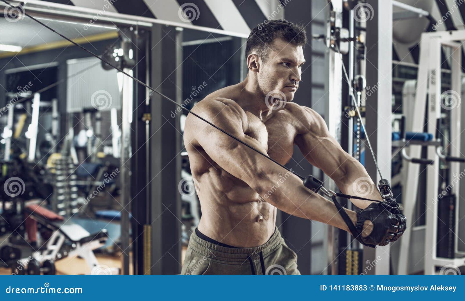 Guy Bodybuilder with Exercise Machine Stock Image - Image of barbell ...