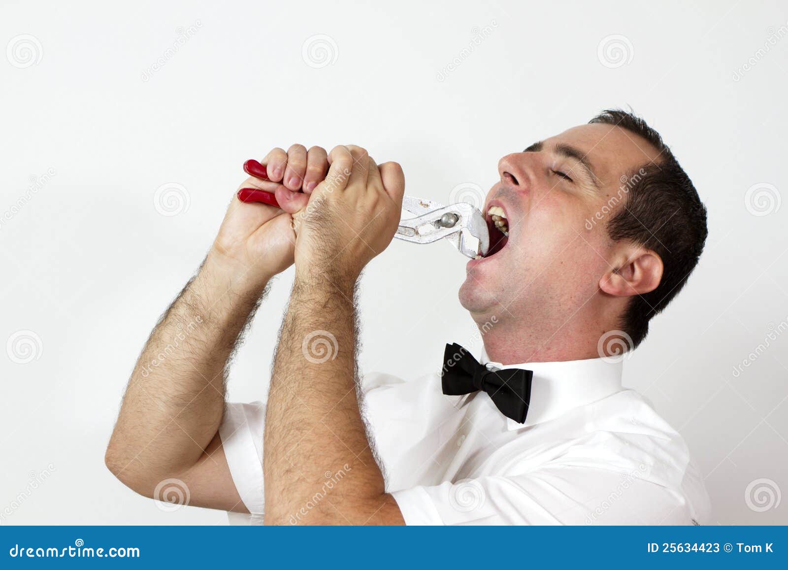 Guy with Bow Tie is Trying To Take Out Tooth Stock Image - Image of ...
