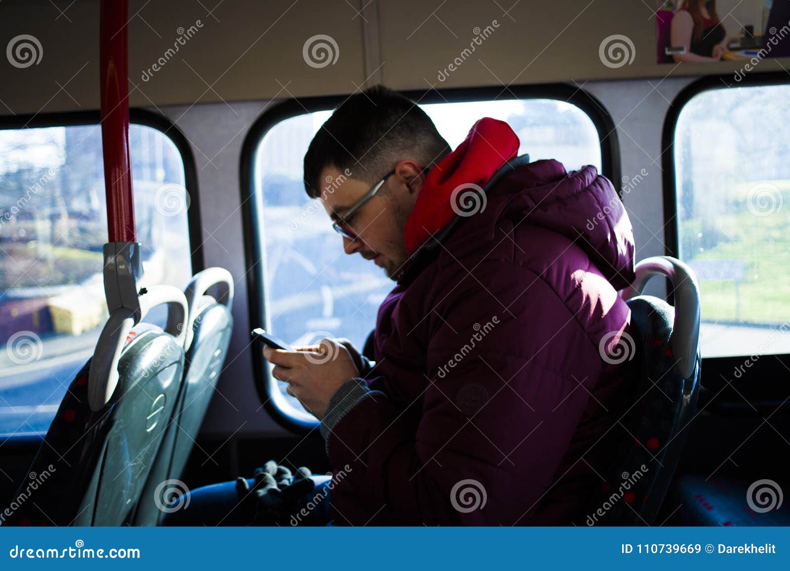 Guy on the Bus Looking at Phone. Stock Image - Image of businessman ...