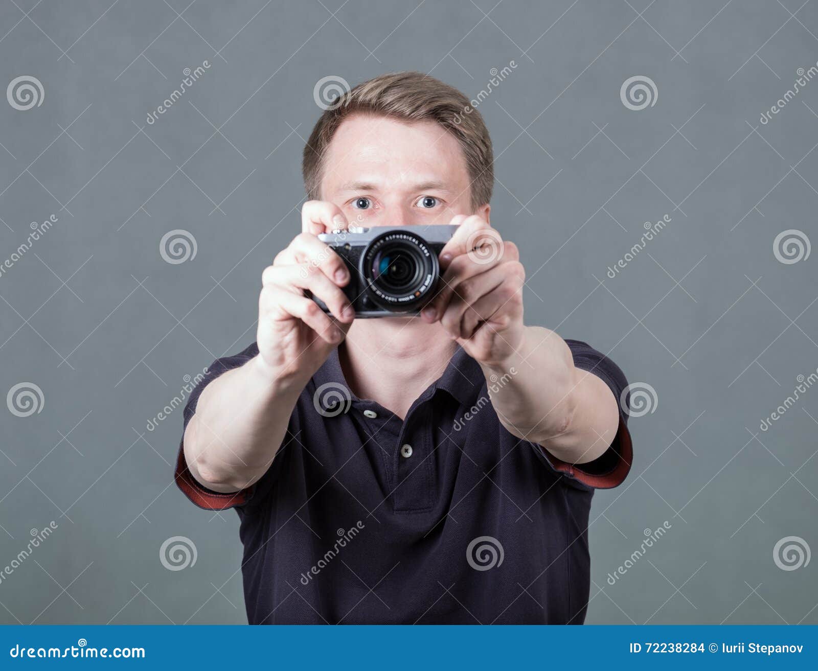 Guy with camera stock photo. Image of studio, people - 72238284