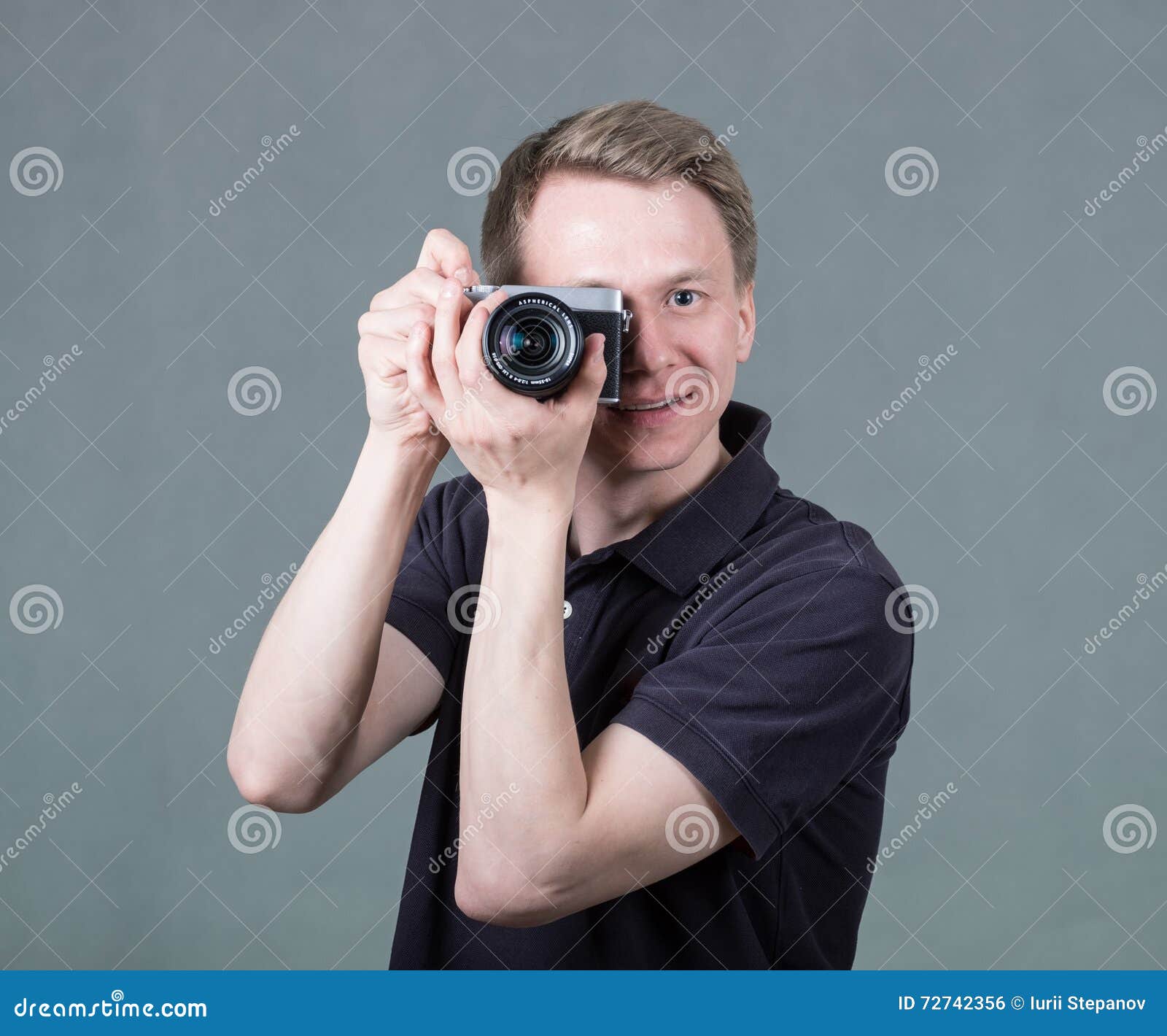Guy with camera stock photo. Image of focus, male, model - 72742356