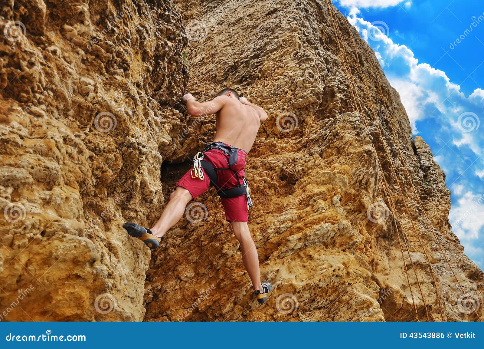 Guy climbing stock photo. Image of dangle, commitment - 43543886