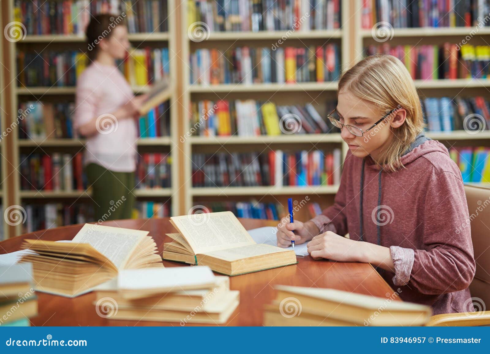 Guy in college library stock image. Image of homework - 83946957