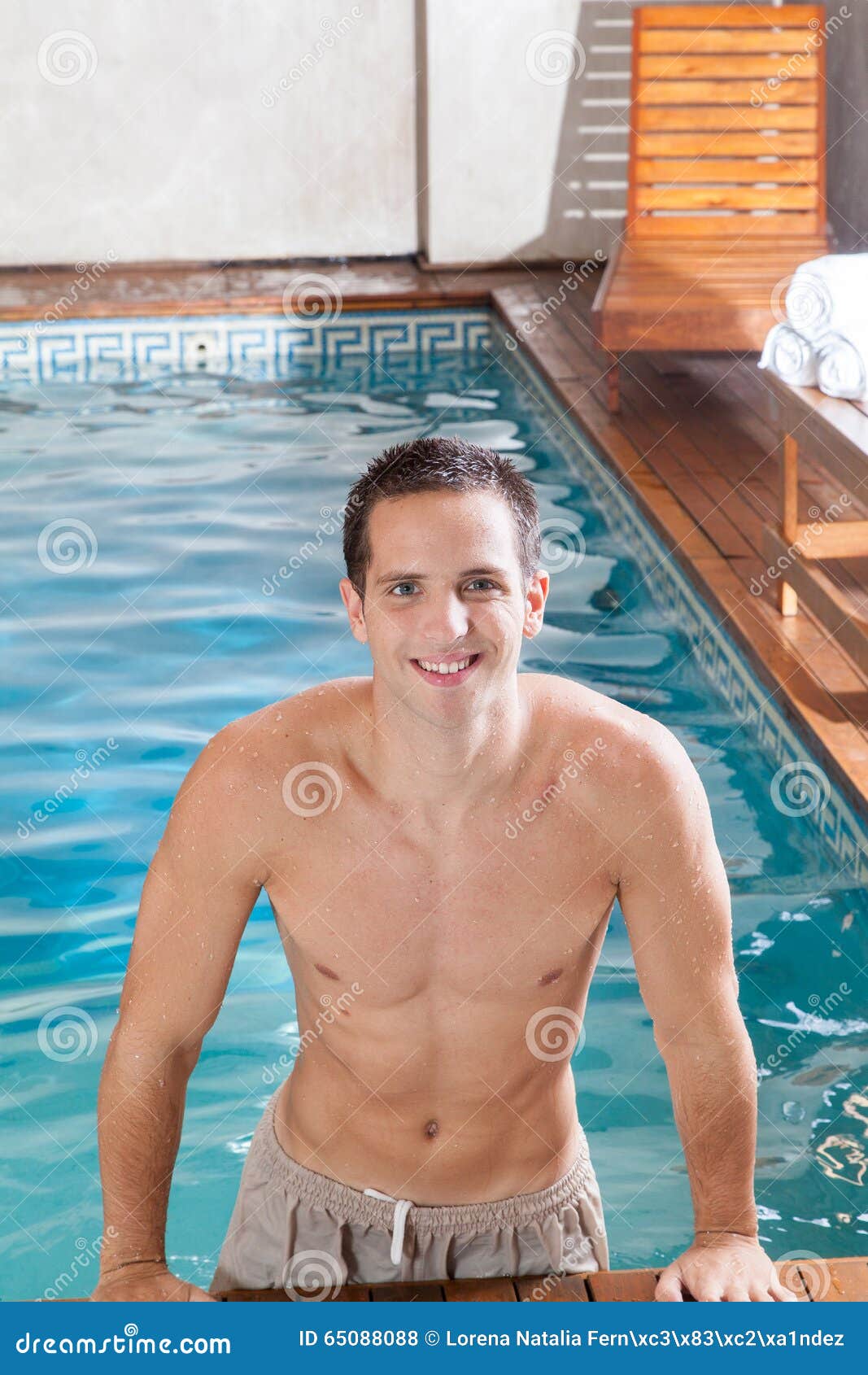 Guy coming out of the pool stock photo. Image of eyes - 65088088