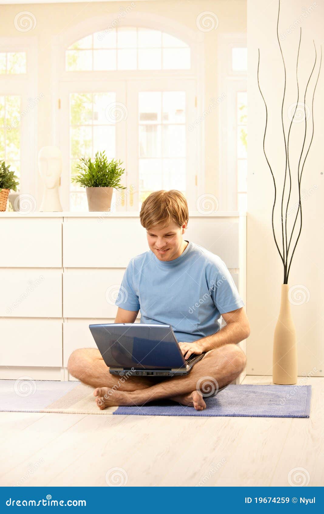 Guy with computer stock image. Image of good, cheerful - 19674259