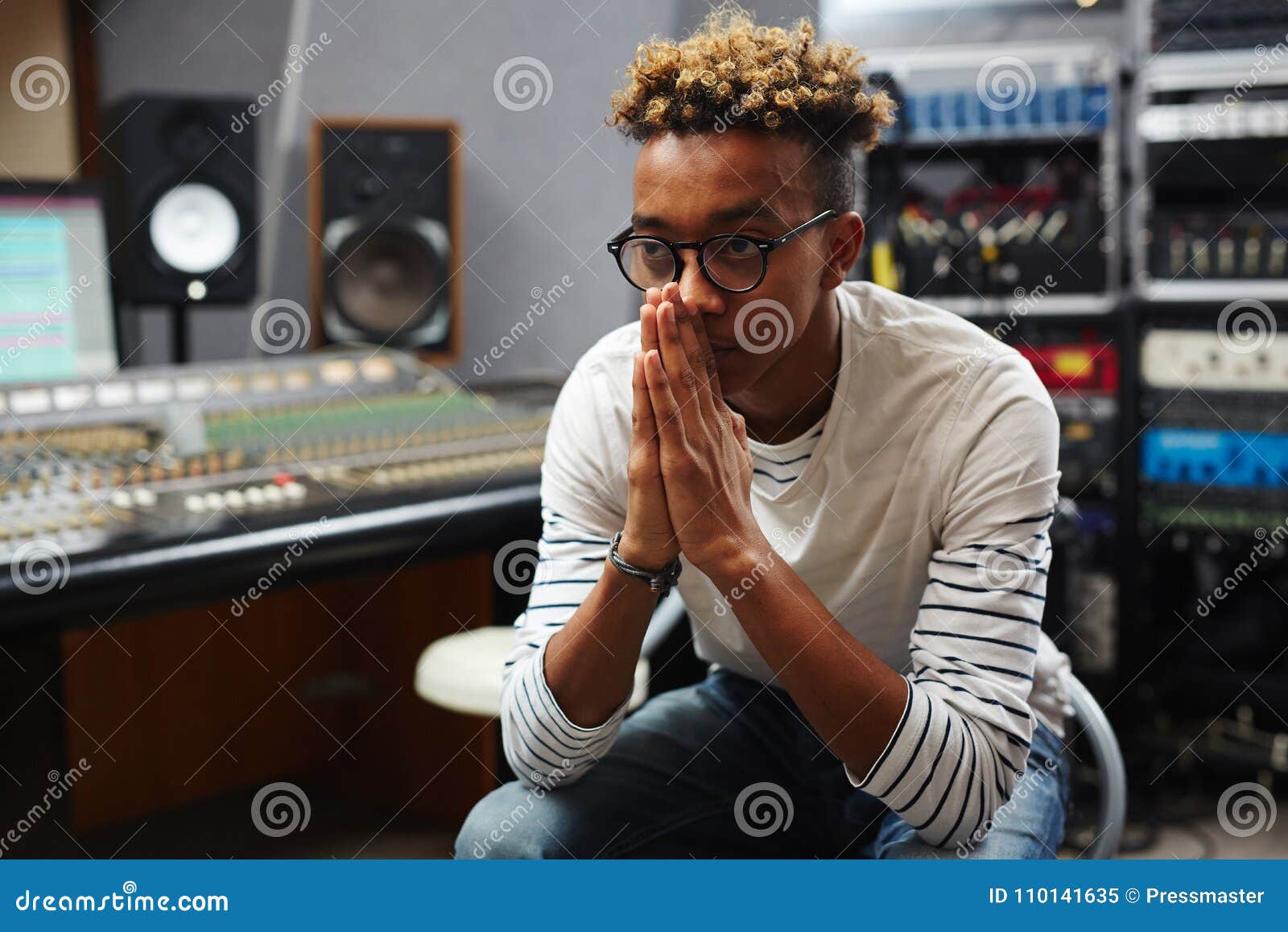 Guy concentrating stock image. Image of eyeglasses, recording - 110141635