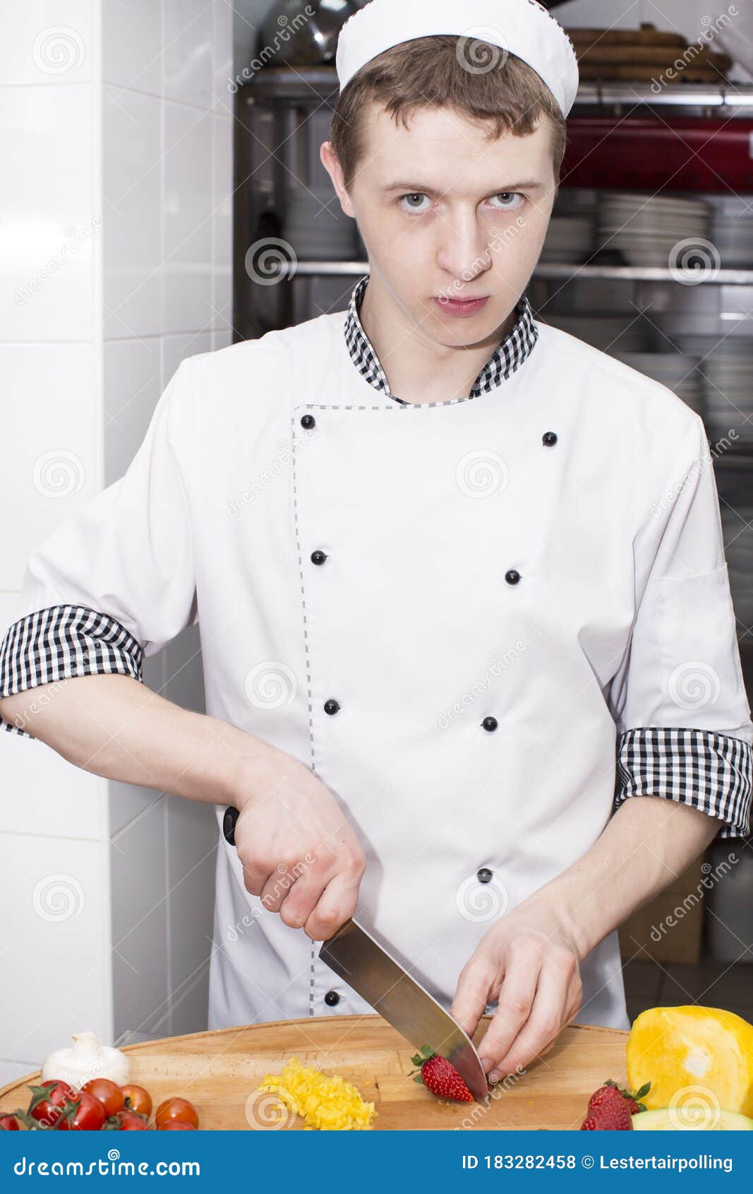 Guy Cook Preparing Delicacies Stock Photo - Image of catering, vertical ...