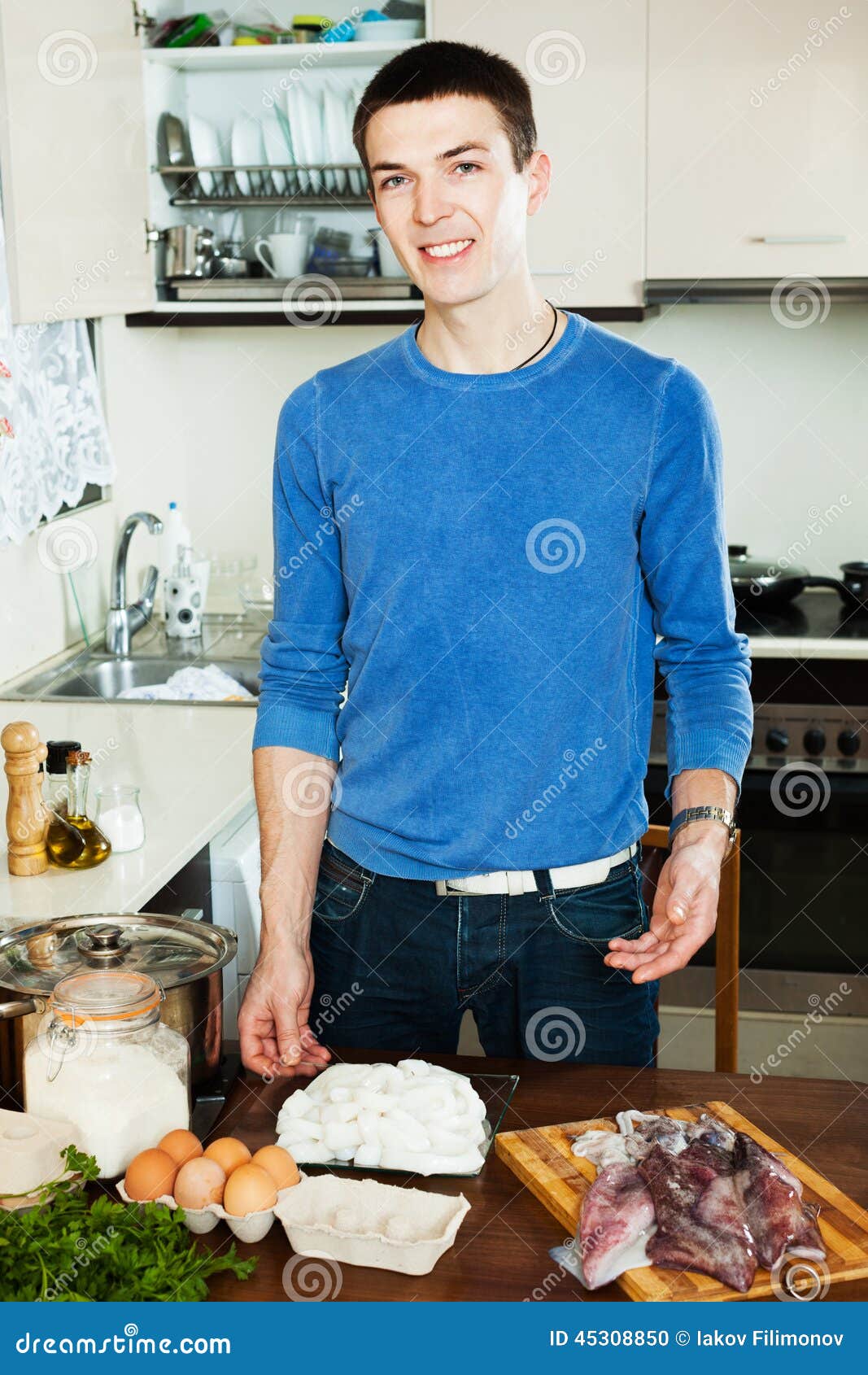 Guy cooking calmari stock photo. Image of fresh, ingridients - 45308850