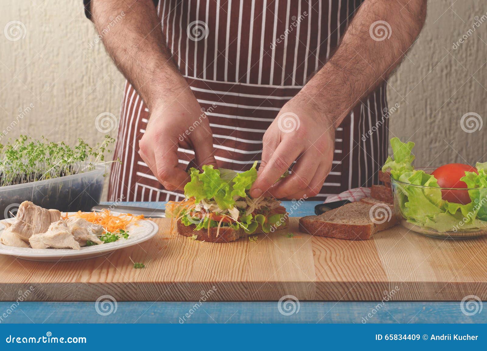 Guy Cooking Chicken Sandwich Stock Image - Image of domestic, adult ...