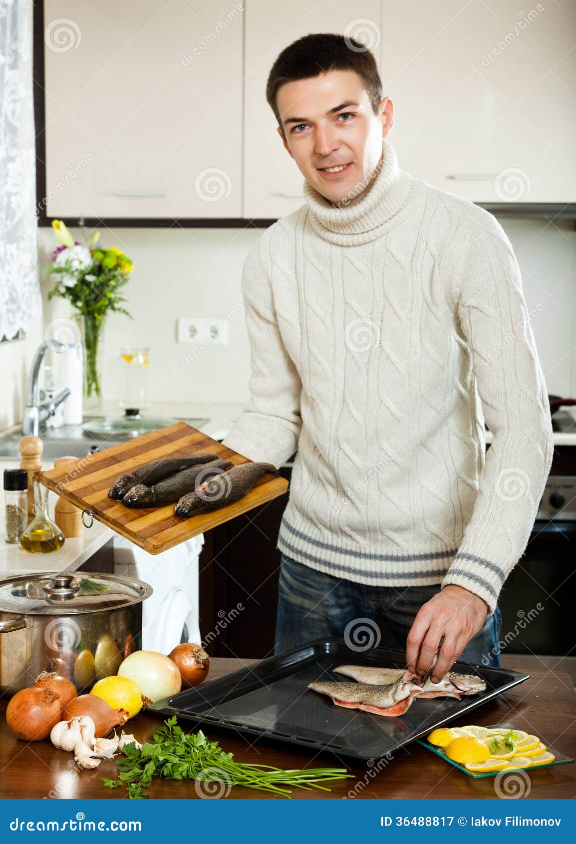 Guy Cooking Fish with Lemon Stock Image - Image of prepare, dishware ...