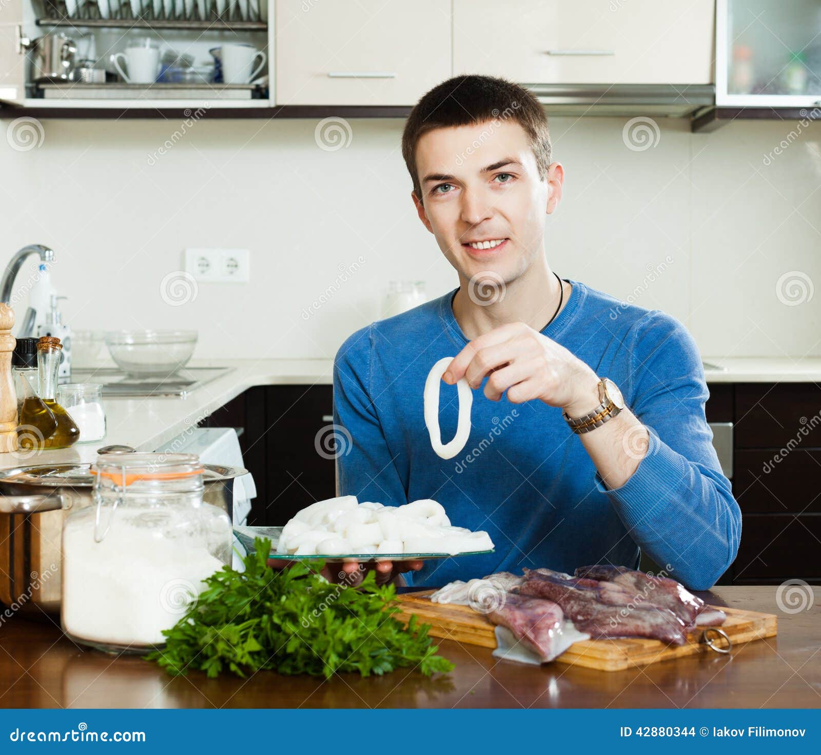 Guy Cooking in Home Kitchen Stock Photo - Image of calamaries, people ...