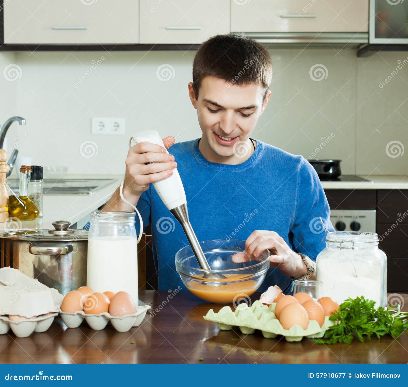 Guy Cooking Scrambled Eggs for Breakfast Stock Image - Image of house ...