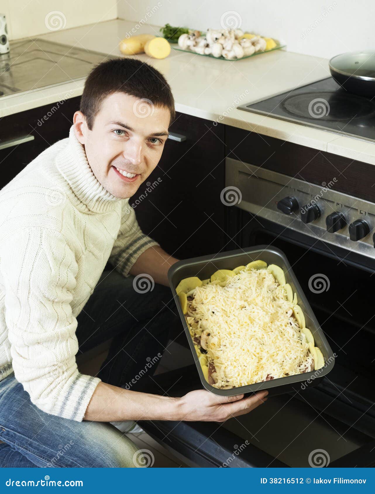Guy Cooking Something at Kitchen Stock Photo - Image of meat, kitchen ...