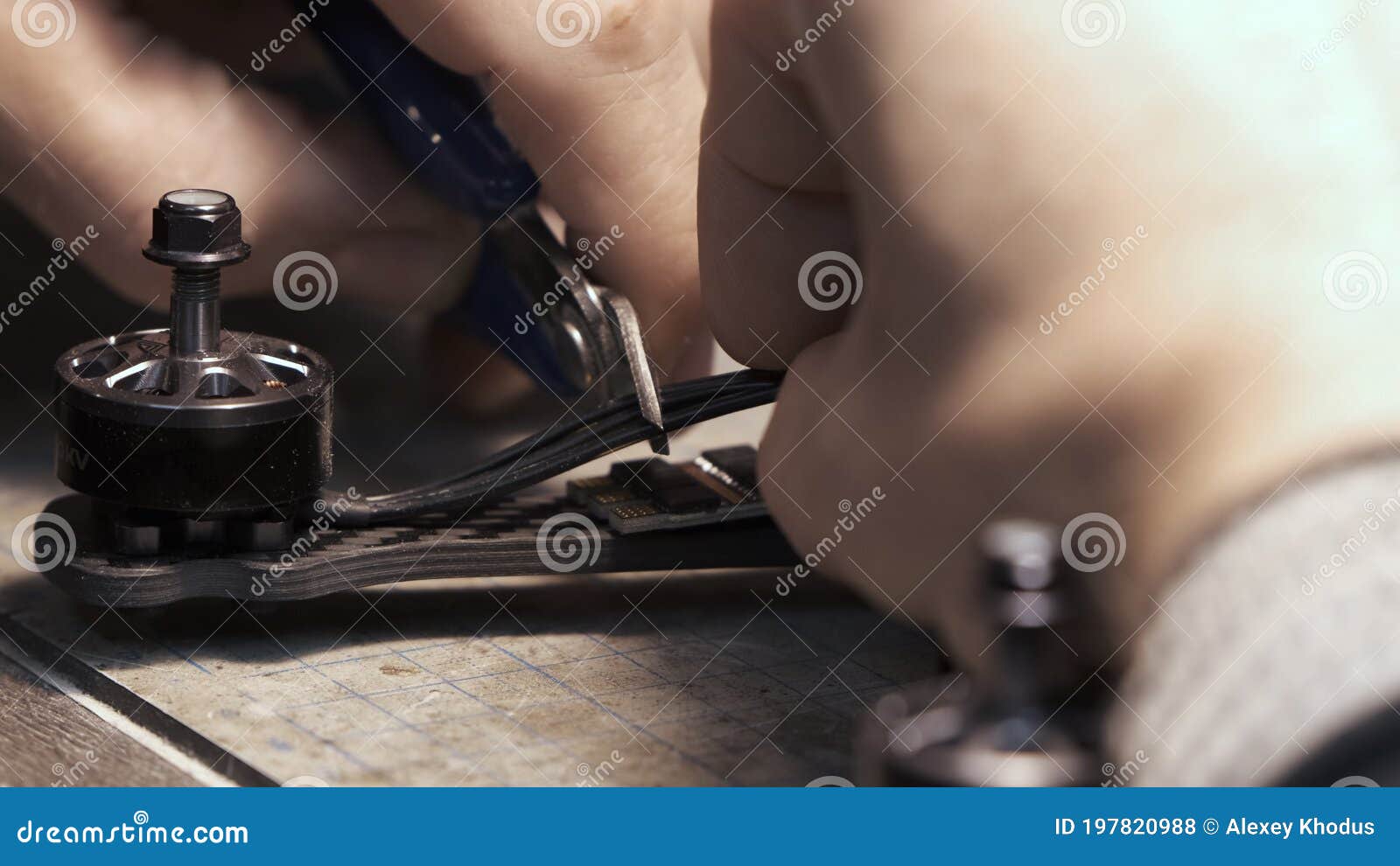 The Guy Cuts Off The Extra Cable For The FPV Drone. Drone Assembly ...