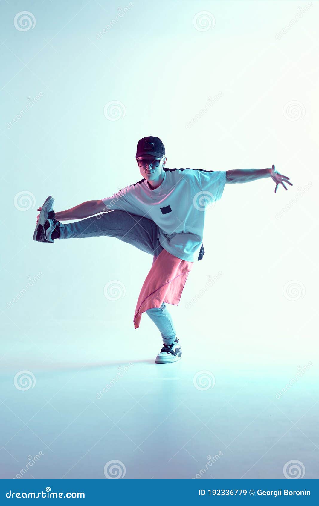Guy Dancing Contemporary Dance in Studio. Neon Light Blue Background ...