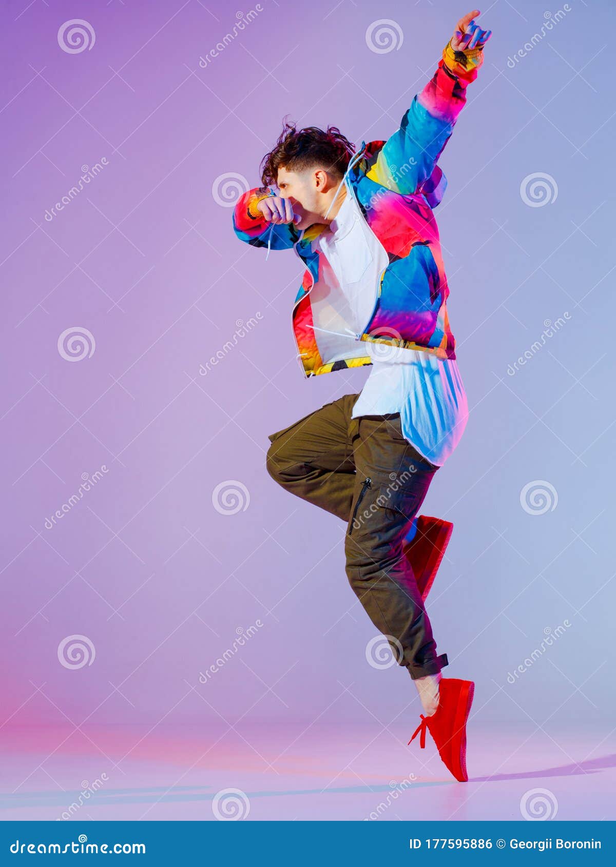Guy Dancing Contemporary Dance in Studio. Neon Light Grey Background ...