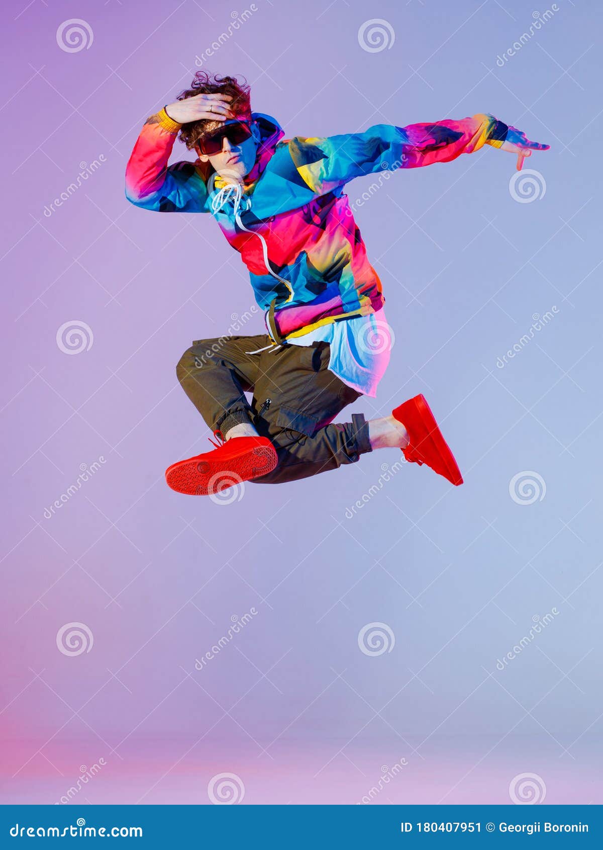 Guy Dancing Contemporary Dance in Studio. Neon Light Grey Background ...