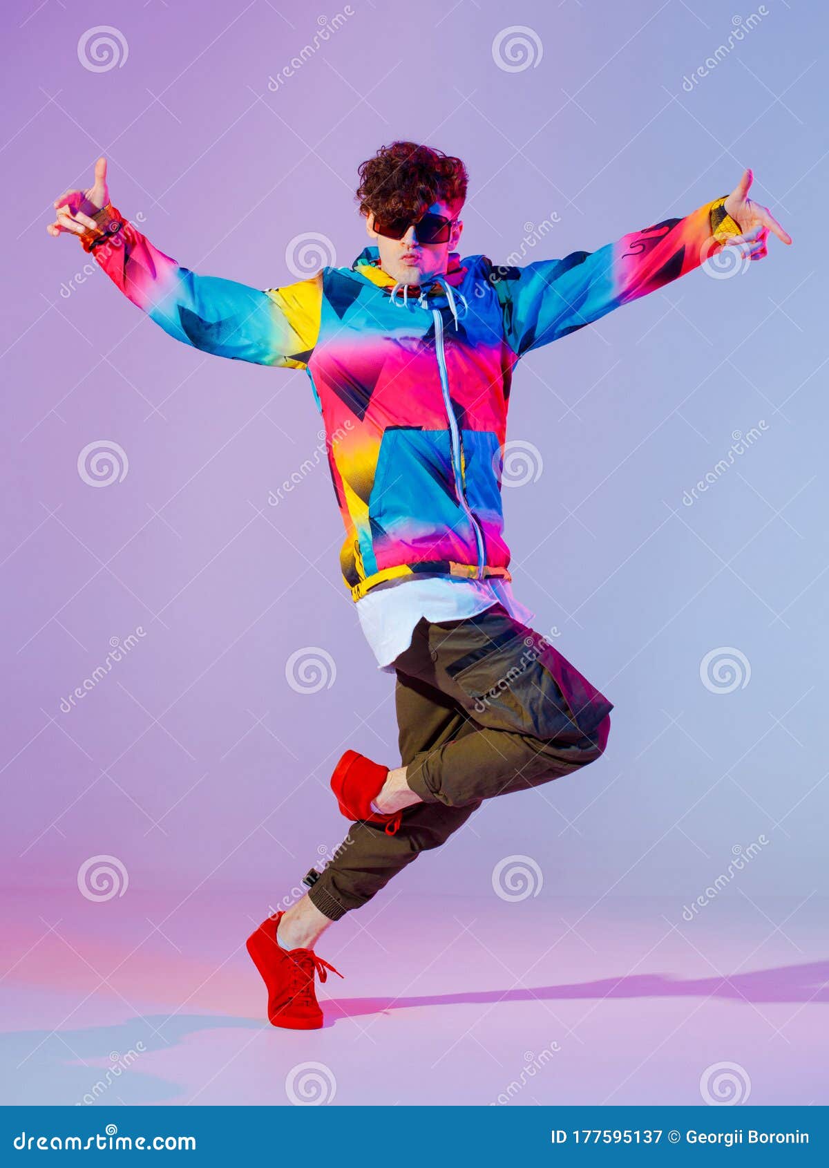 Guy Dancing Contemporary Dance in Studio. Neon Light Grey Background ...
