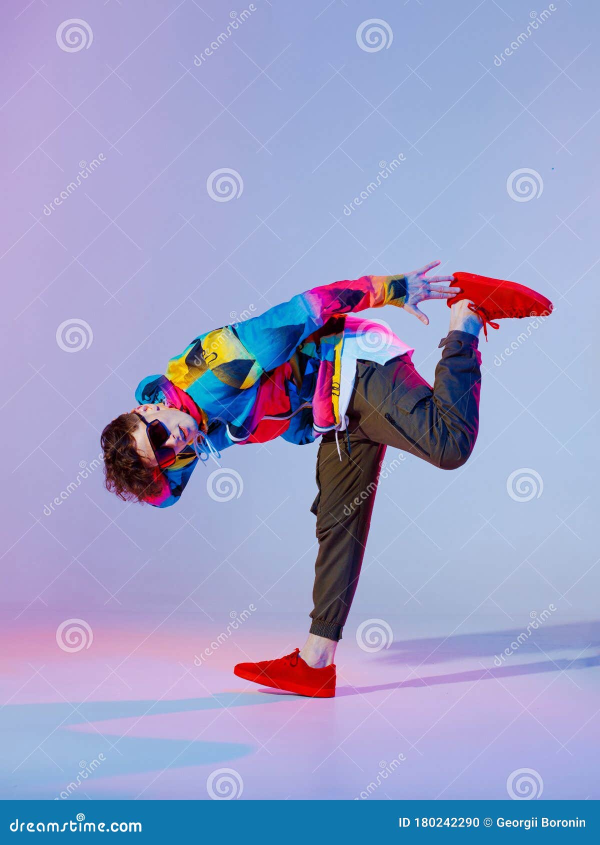Guy Dancing Contemporary Dance in Studio. Neon Light Grey Background ...