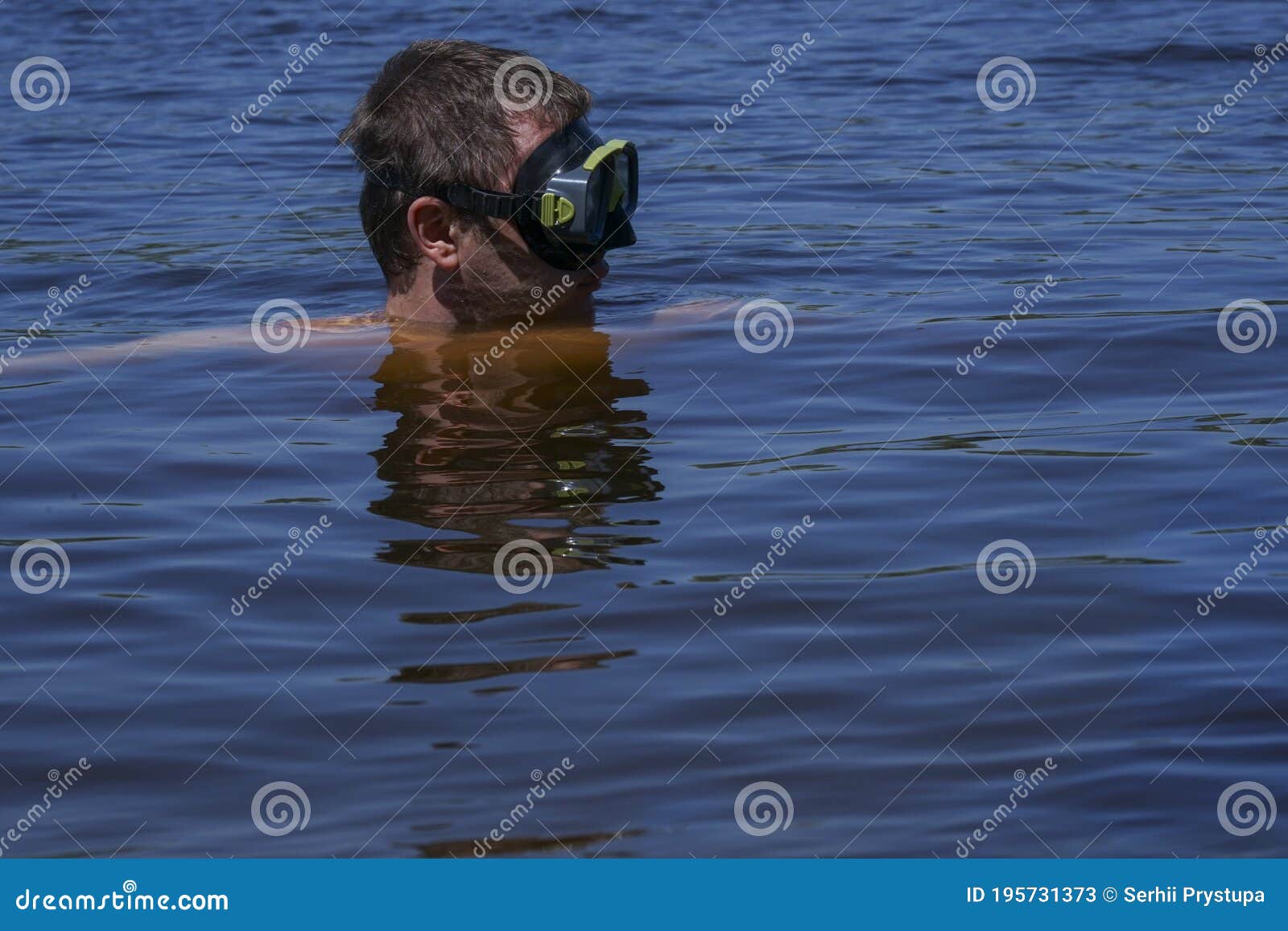 A Guy in a Diving Mask Dives Out of the Water Stock Image - Image of ...