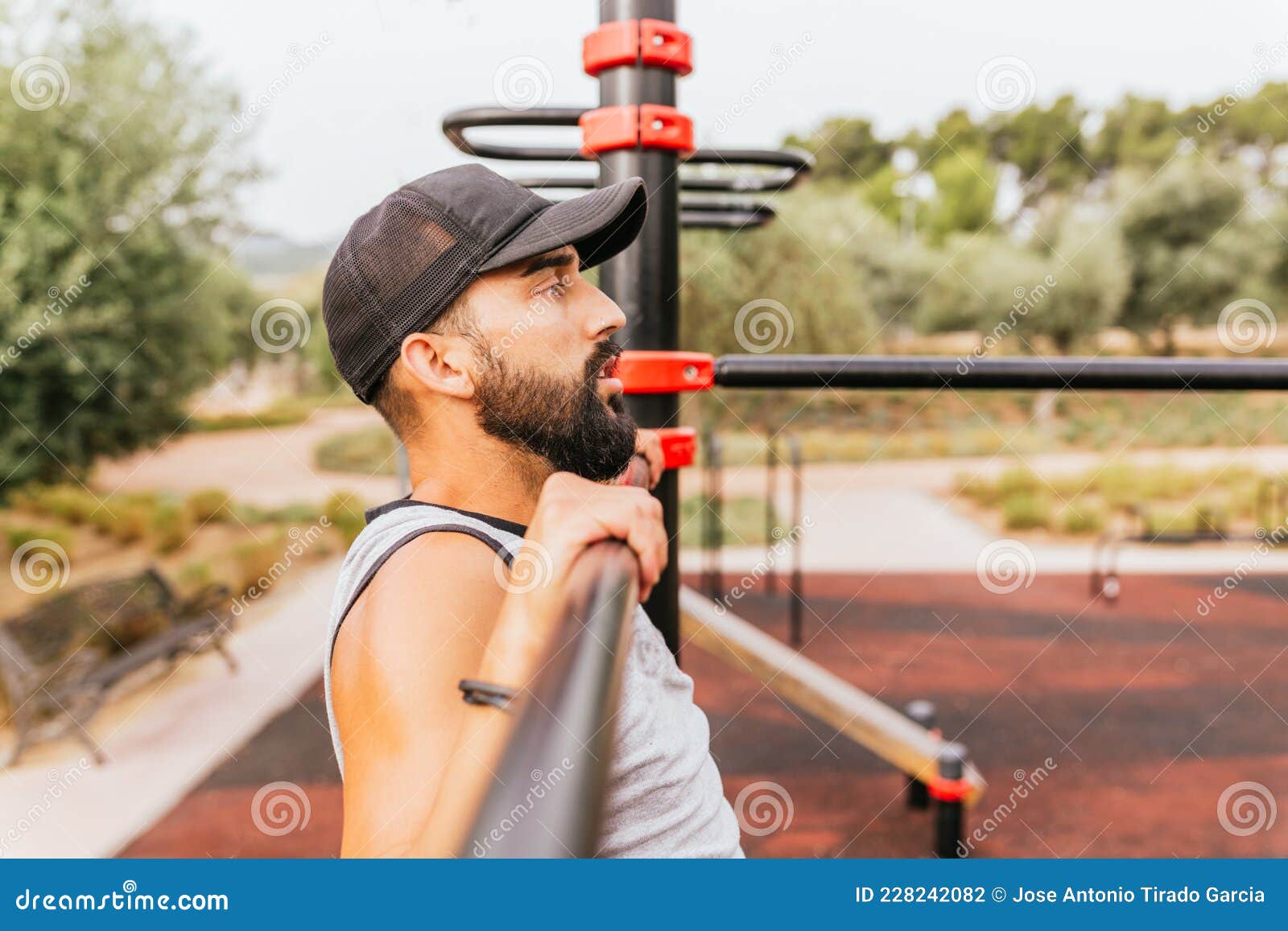 Guy doing pull-ups on pole stock photo. Image of healthy - 228242082
