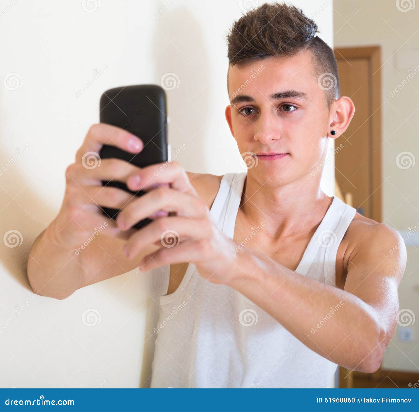 Guy Doing Selfie on Smartphone Stock Photo - Image of resting, device ...