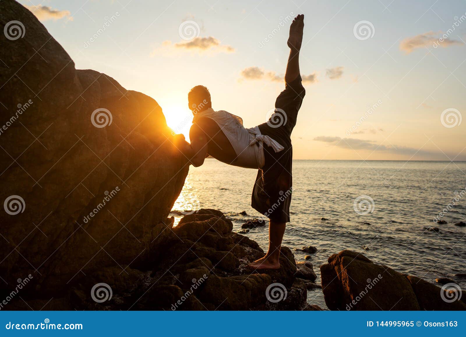 Guy Doing Yoga at Sunset by the Sea Stock Image - Image of pilates ...