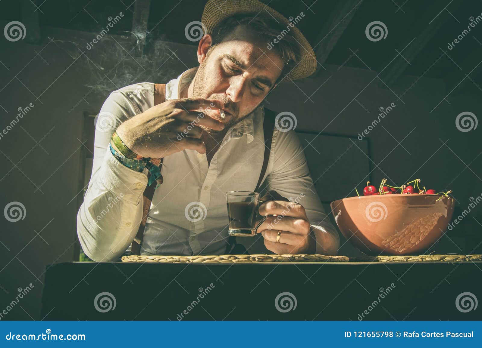 Guy Drinking Coffee and Smoking a Cigarette. Stock Photo - Image of ...