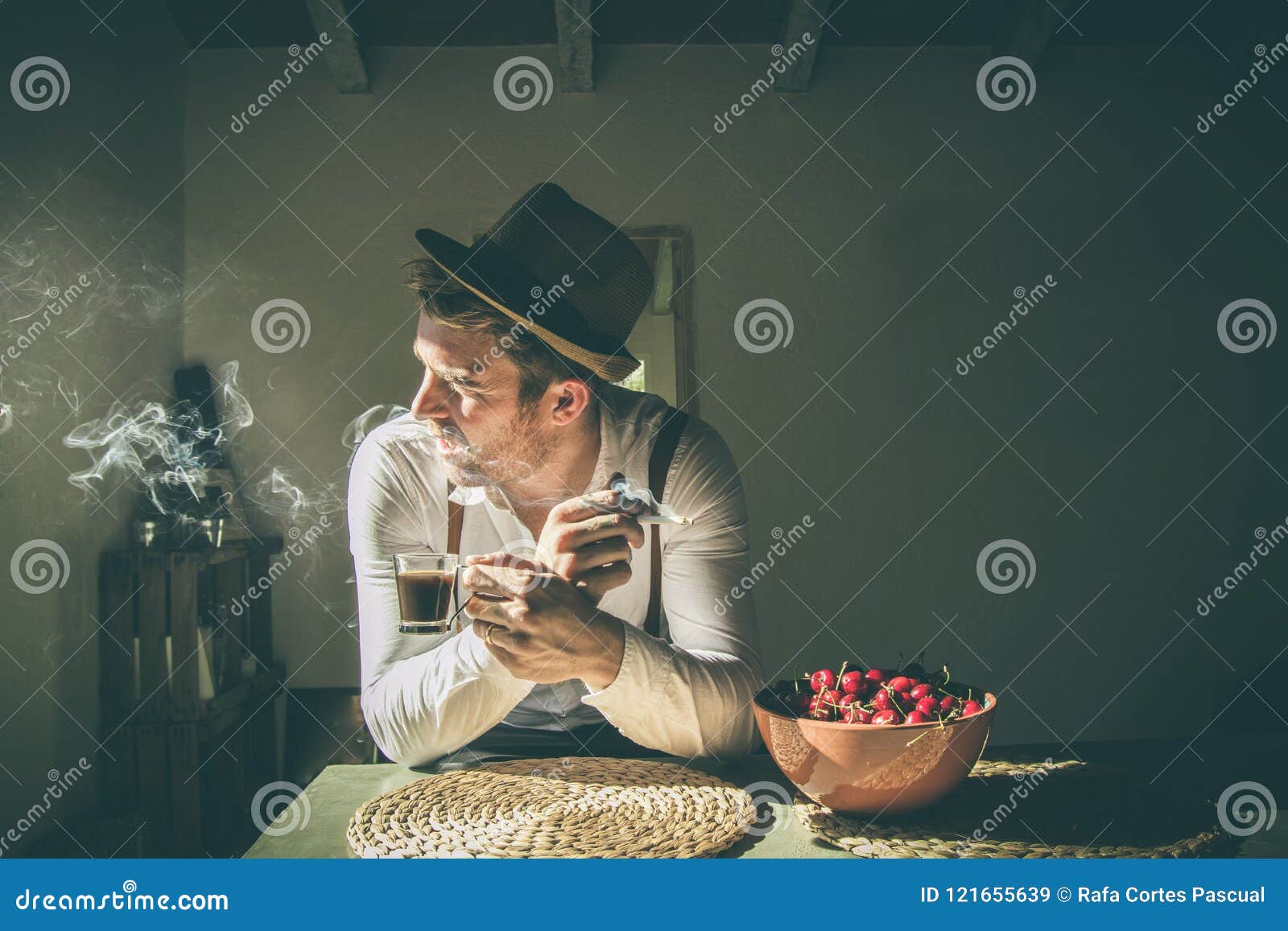 Guy Drinking Coffee and Smoking a Cigarette. Stock Image - Image of ...