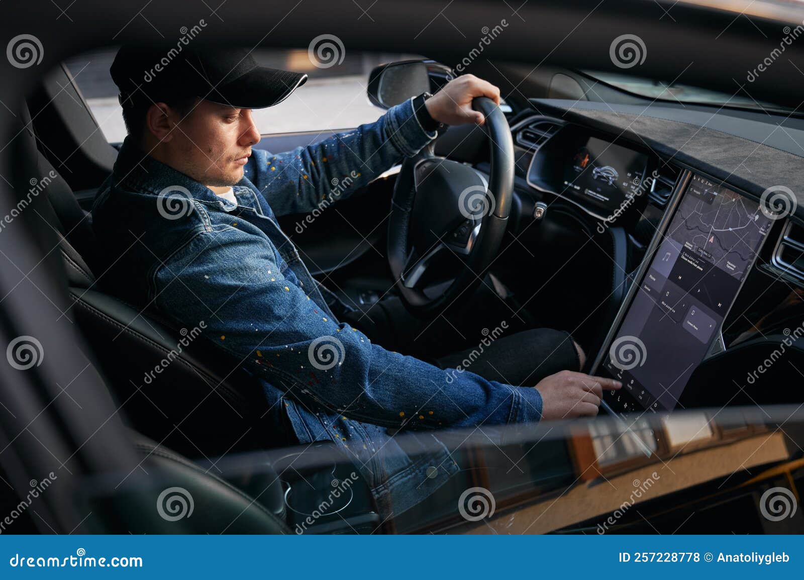 Guy Driving Car Using Touch Screen on Control Panel. Stock Photo ...