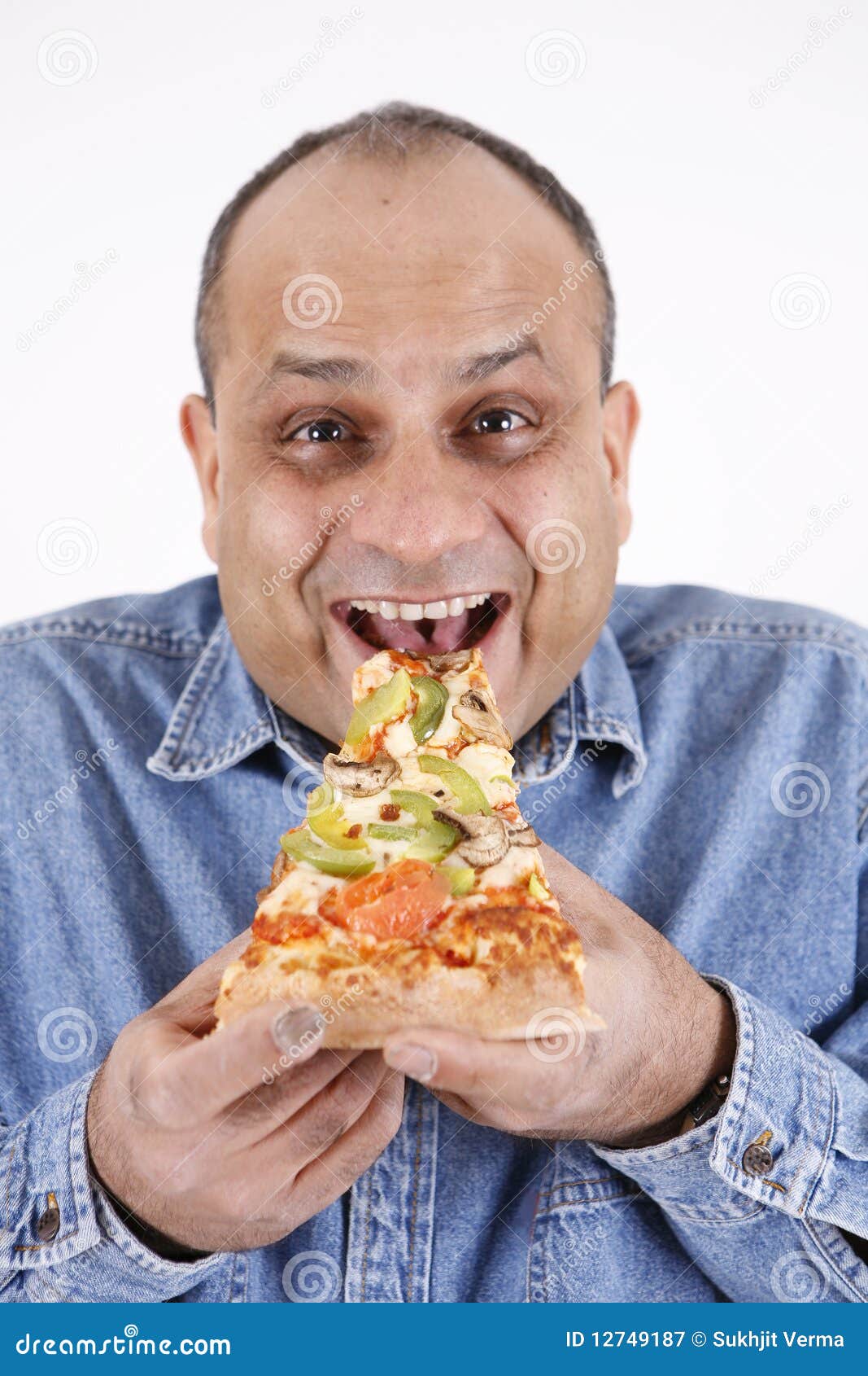 Guy eating pizza slice stock image. Image of crispy, cheese - 12749187