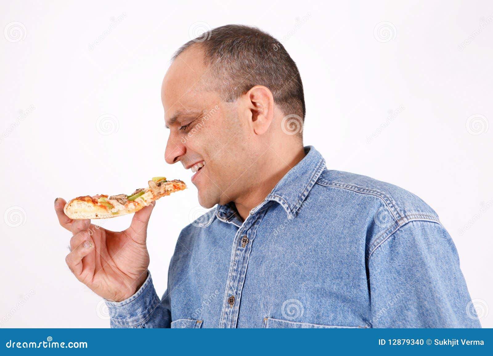Guy eating pizza slice stock photo. Image of lunch, smiling - 12879340