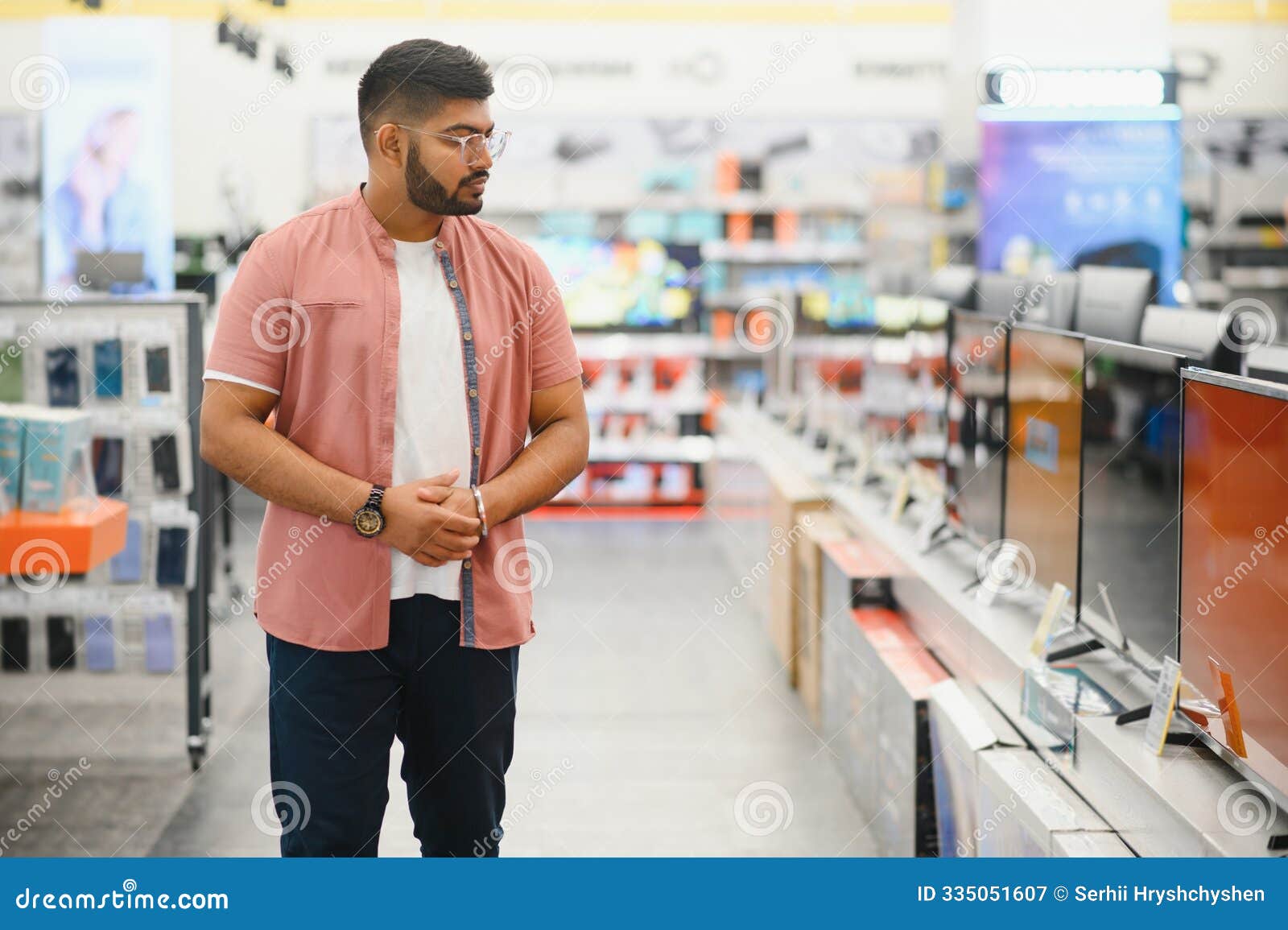 Indian Man in an Electronics Store Stock Image - Image of computer ...