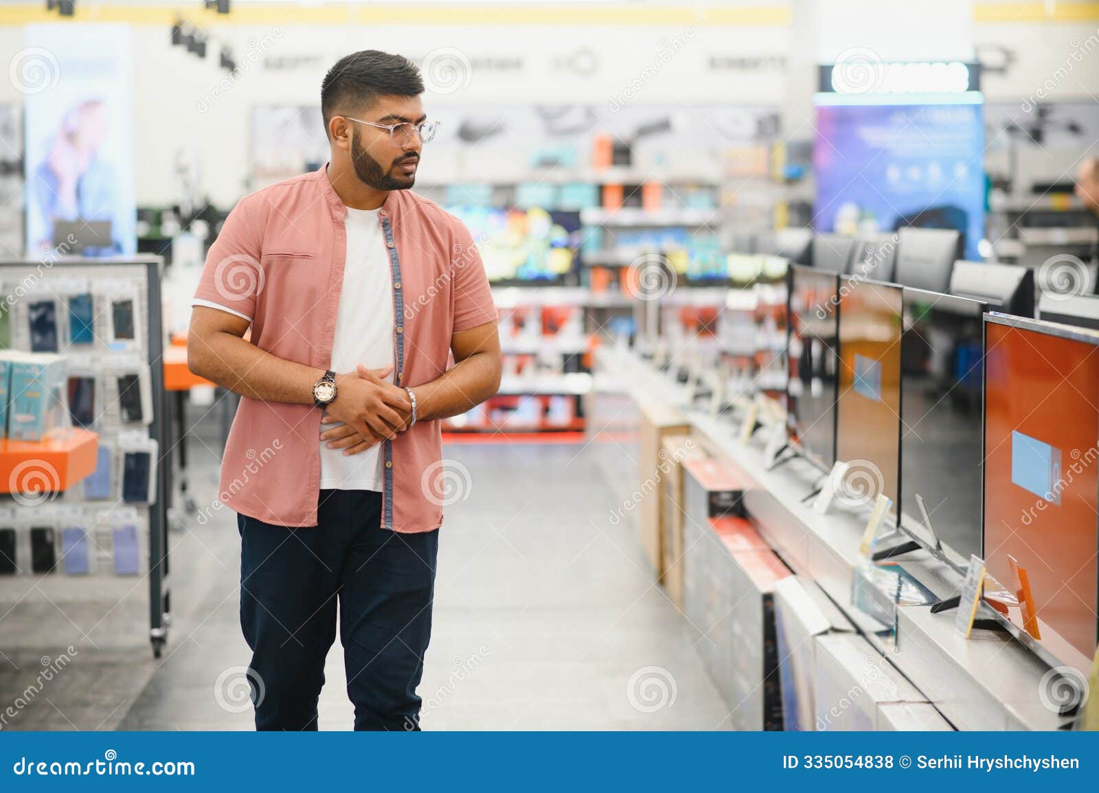 Indian Man in an Electronics Store Stock Photo - Image of choose ...