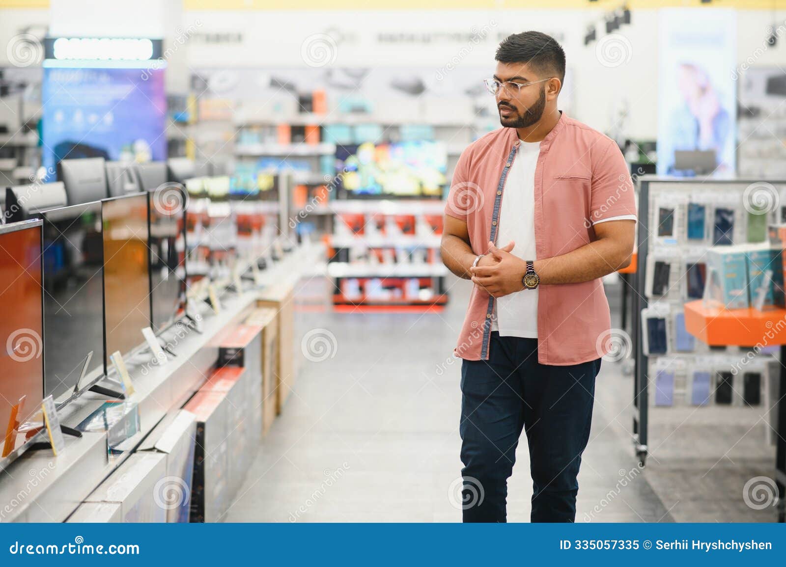 Indian Man in an Electronics Store Stock Image - Image of business ...