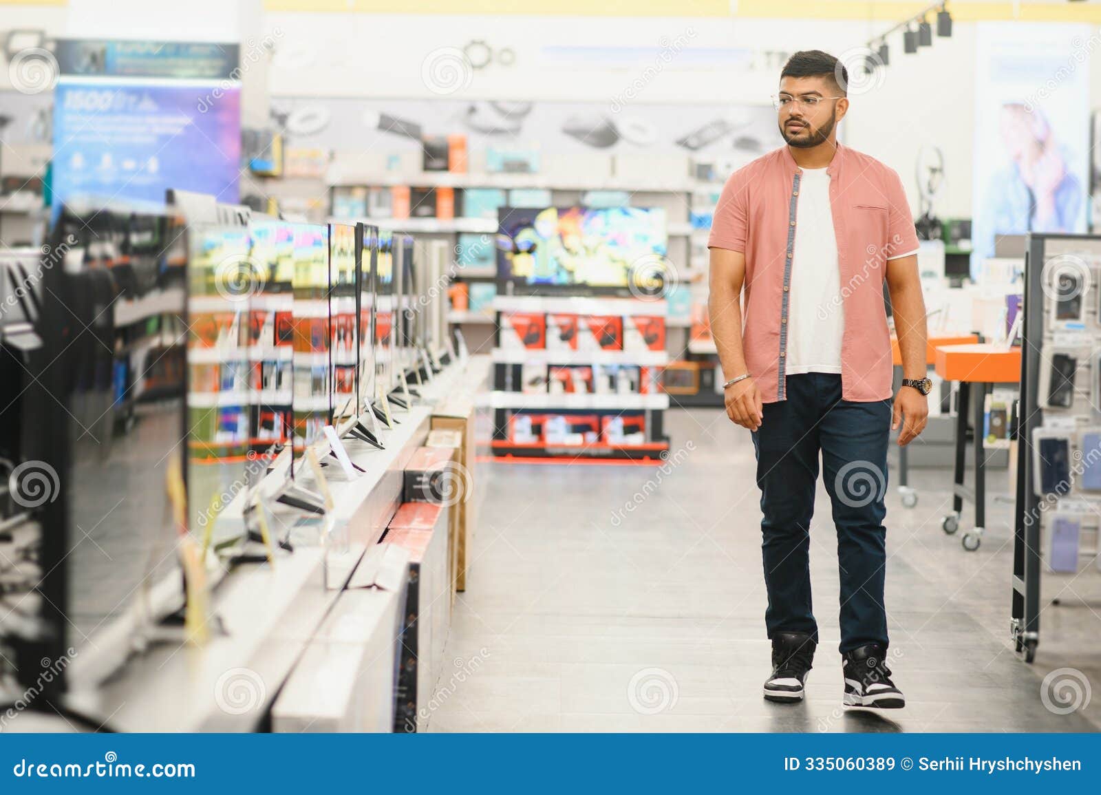 Indian Man in an Electronics Store Stock Image - Image of design ...
