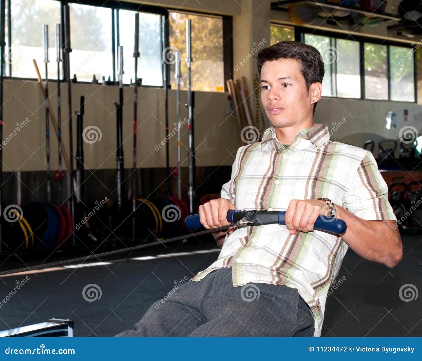 Guy exercising in a gym stock photo. Image of move, indoor - 11234472