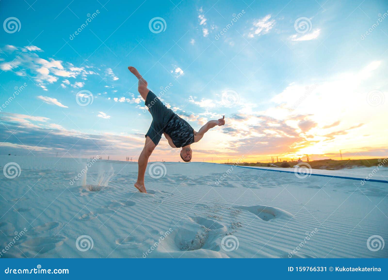Guy Flies Upside Down on Sand in the Desert Stock Image - Image of ...