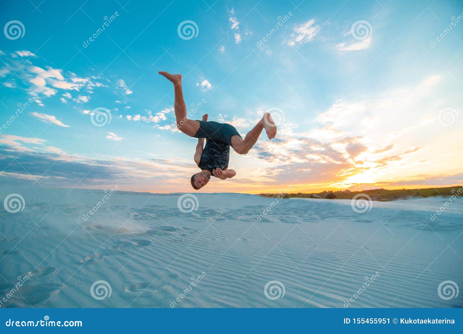 Guy Flies Upside Down on Sand in the Desert Stock Image - Image of ...