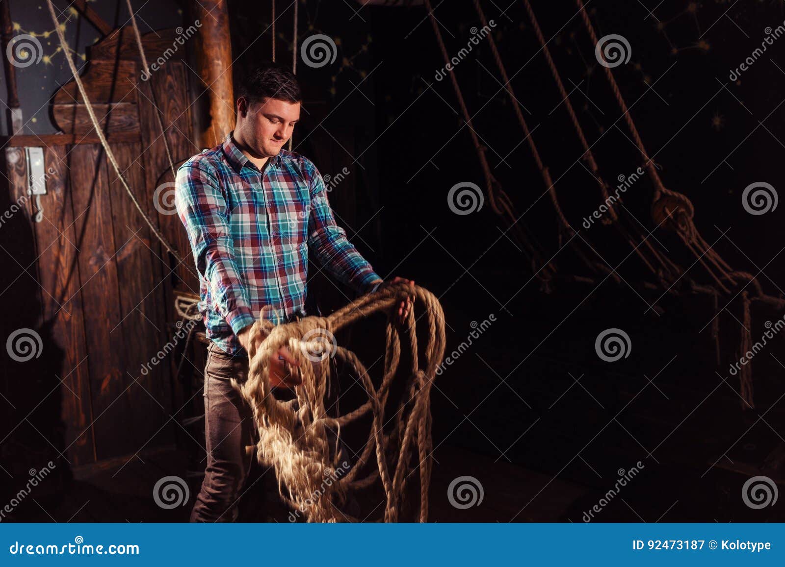 Guy Freed from Captivity and Selecting from Ropes Stock Image - Image ...