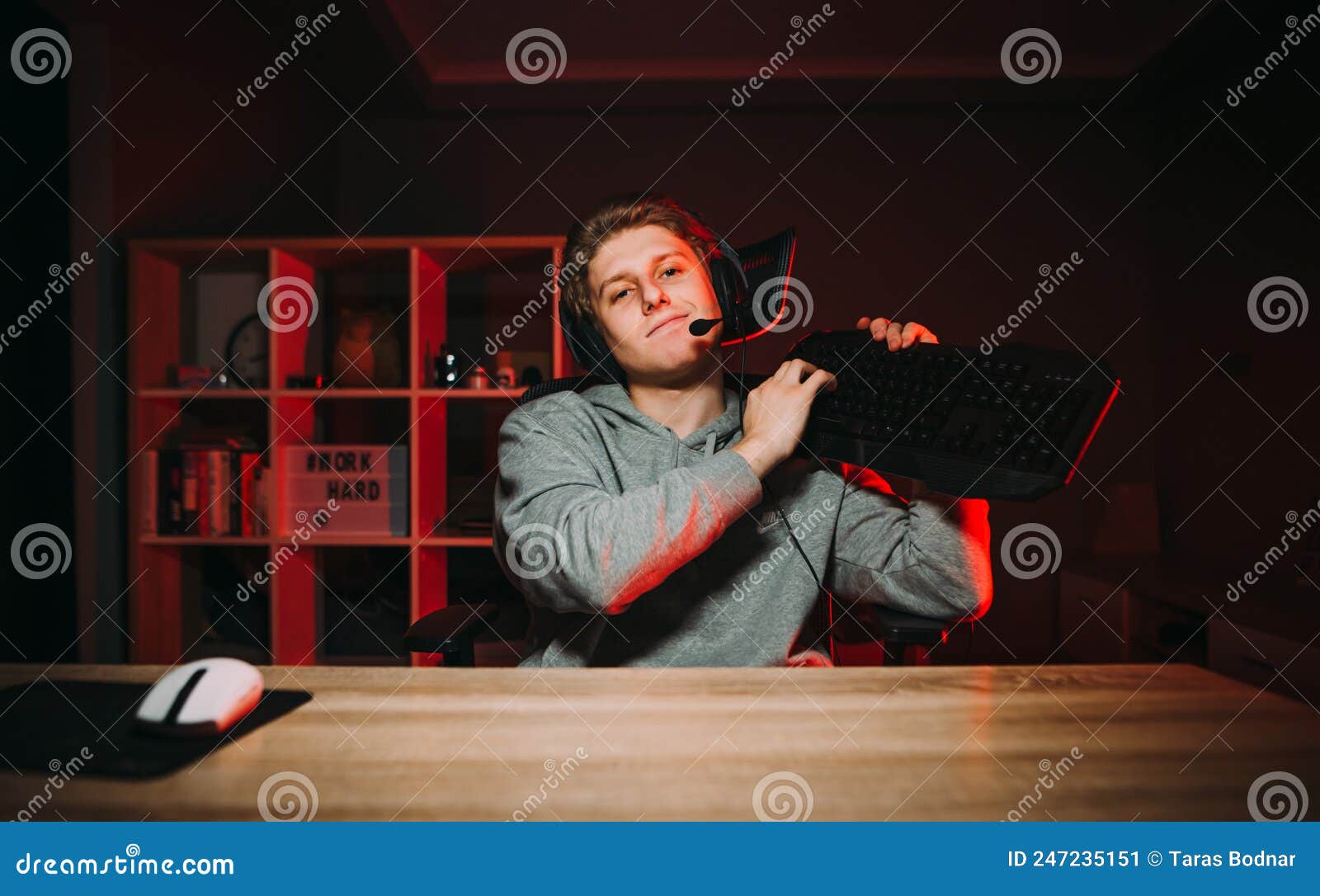 Guy Gamer with a Keyboard on His Shoulder Playing Online Games on the ...