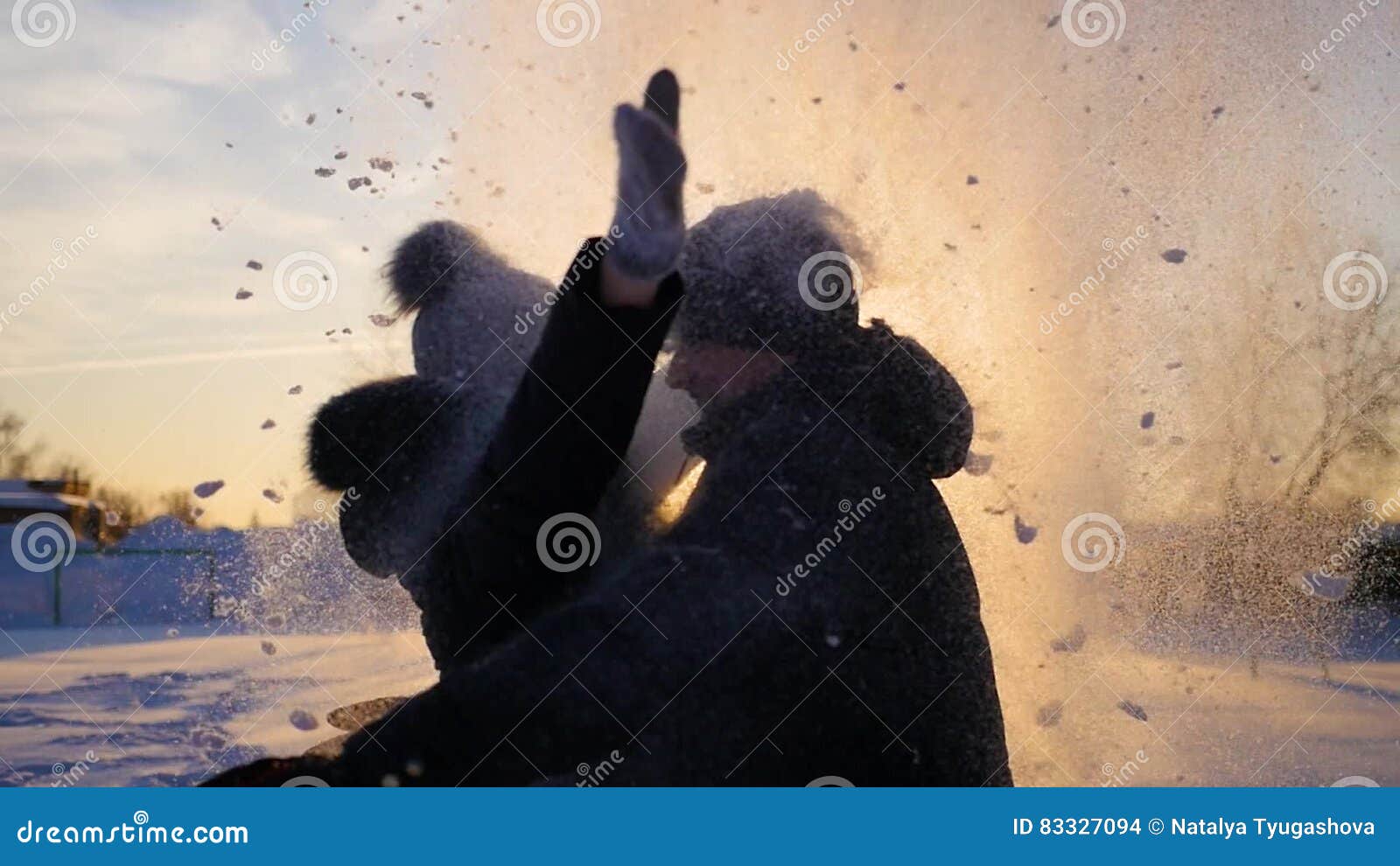 A Guy and a Girl Throws Snow Above Head and Hugging on Sunset ...