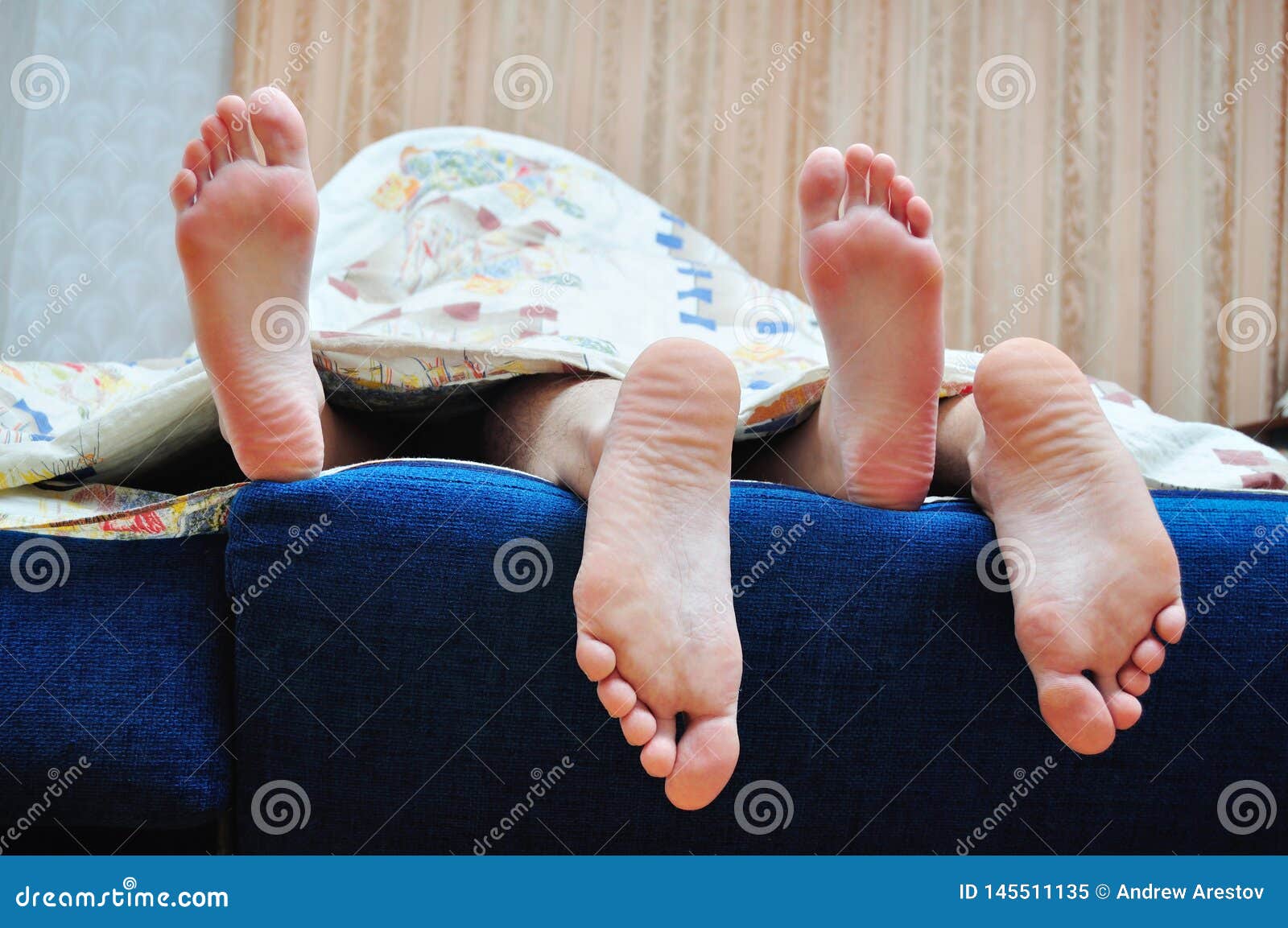 Boy and Girl`s Legs Under the Blanket Stock Image - Image of barefoot ...