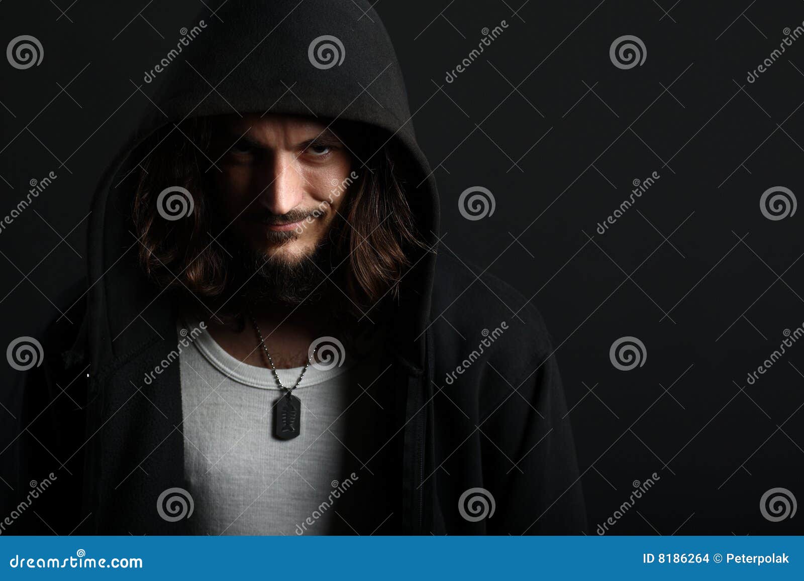Guy Grinning in Hood with Dogtag Stock Photo - Image of nose, fashion ...
