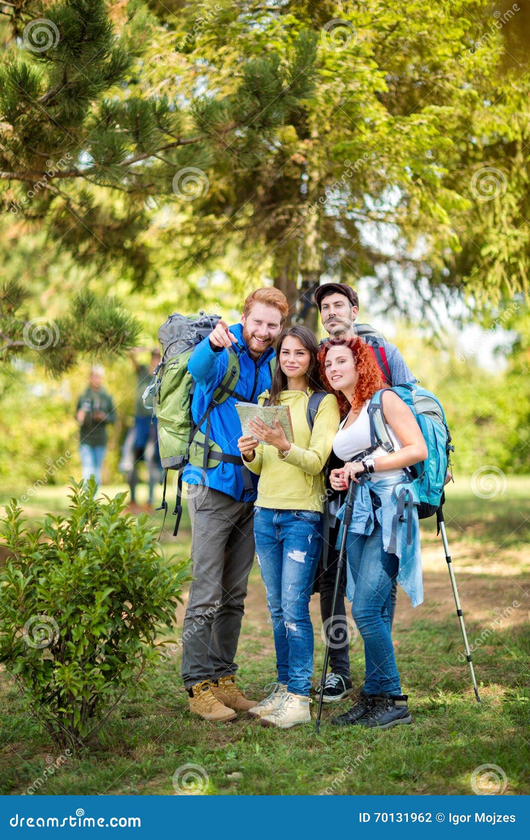 Guy from Group of Hikers Shows the Direction of Movement Stock Photo ...