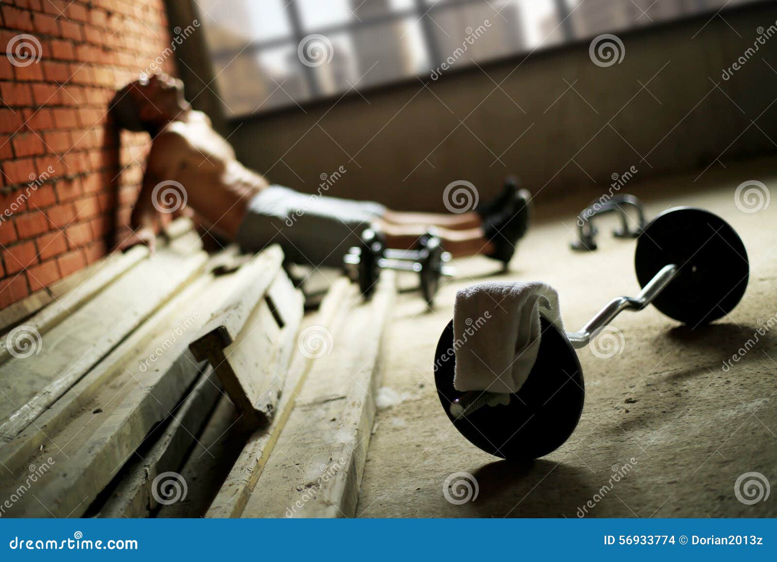 Guy in the gym stock photo. Image of fitness, dumbbell - 56933774