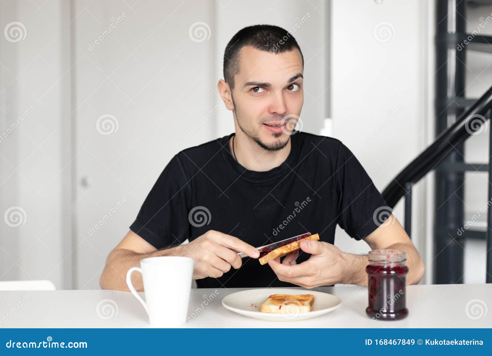 The Guy Has Breakfast with Toast with Jam Stock Image - Image of ...