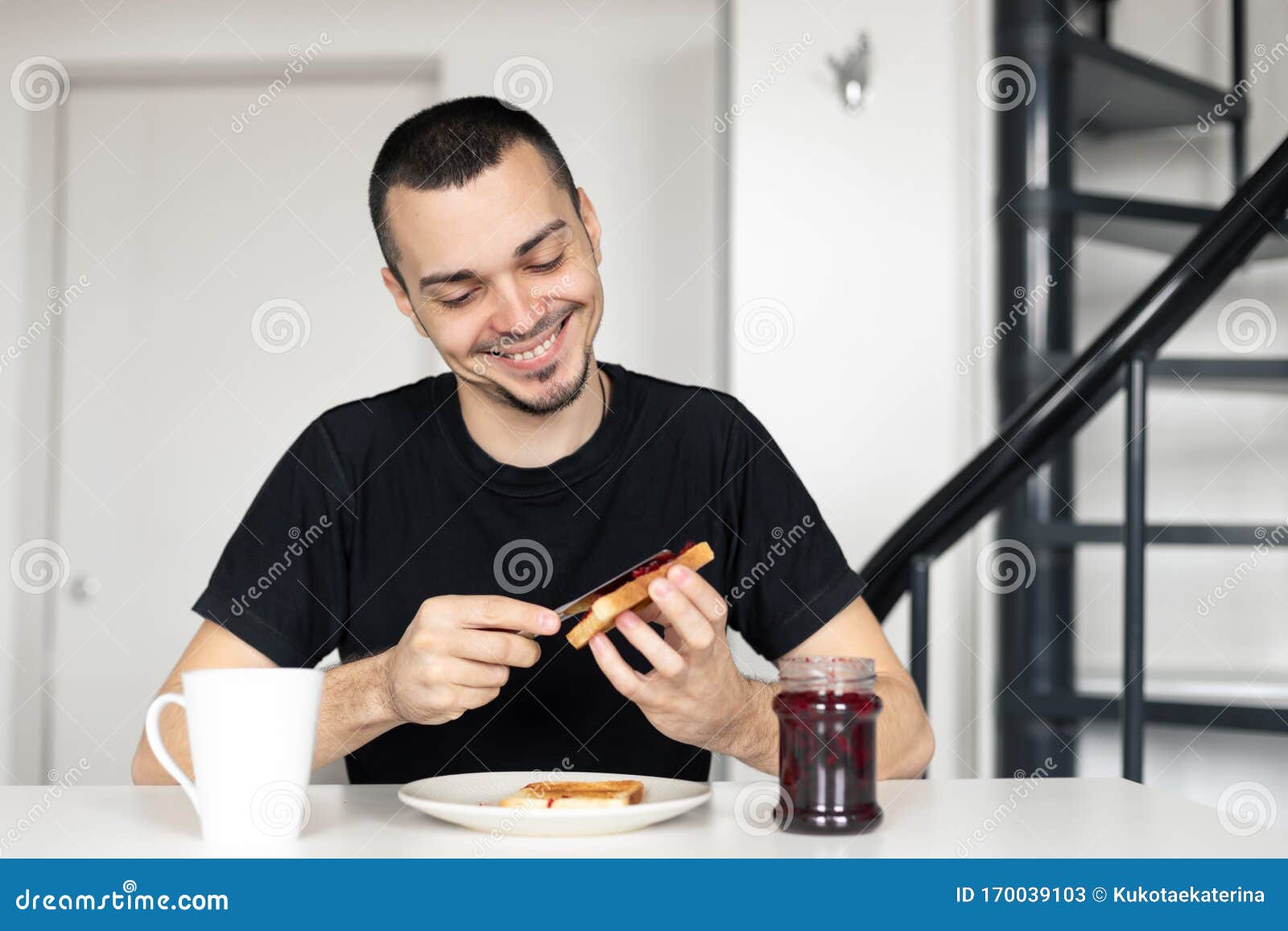 The Guy Has Breakfast with Toast with Jam Stock Image - Image of ...