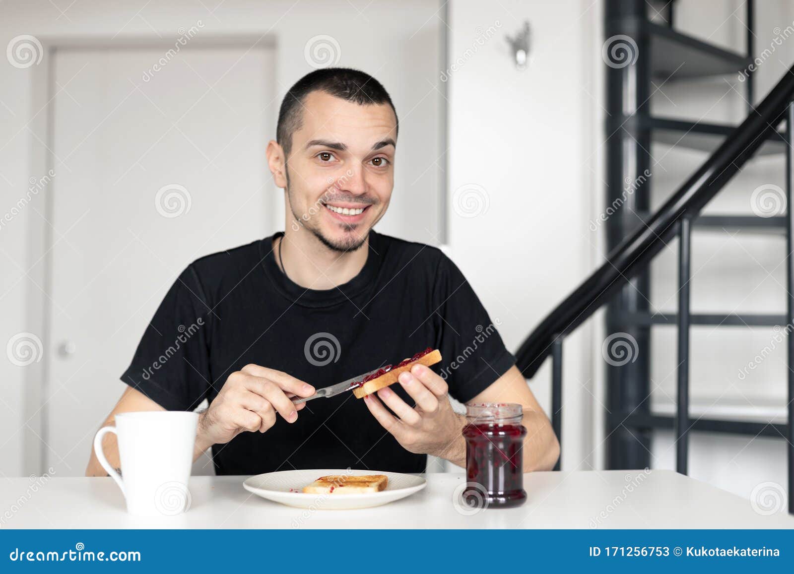 The Guy Has Breakfast with Toast with Jam Stock Image - Image of ...